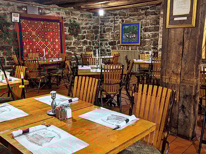 Wooden chairs, stone walls, and a quilt that tells stories—dining rooms don't get more authentically Pennsylvania than this historic space.