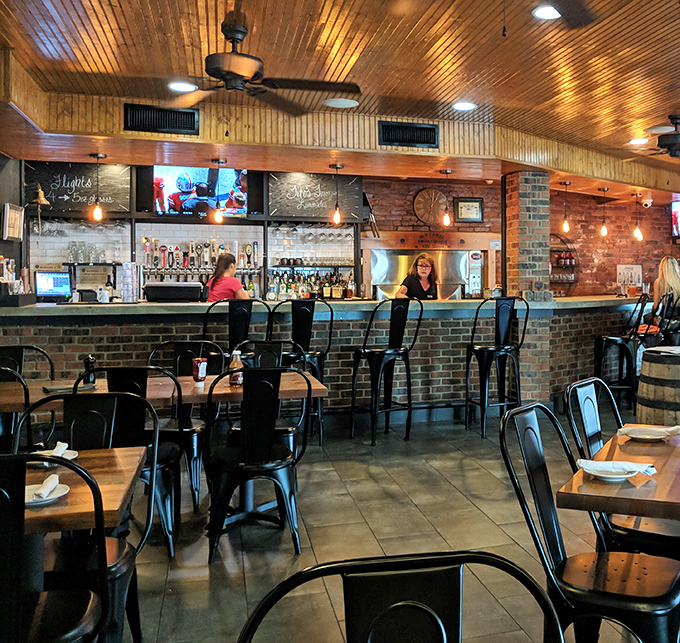 Exposed brick and warm wood create an ambiance that whispers "stay awhile" in every corner.