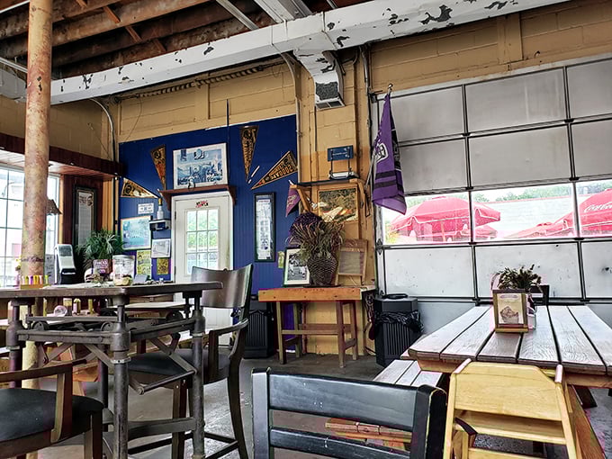 The rustic interior doesn't just house diners—it preserves BBQ traditions with every wooden beam and blue wall that's absorbed decades of smoky stories.