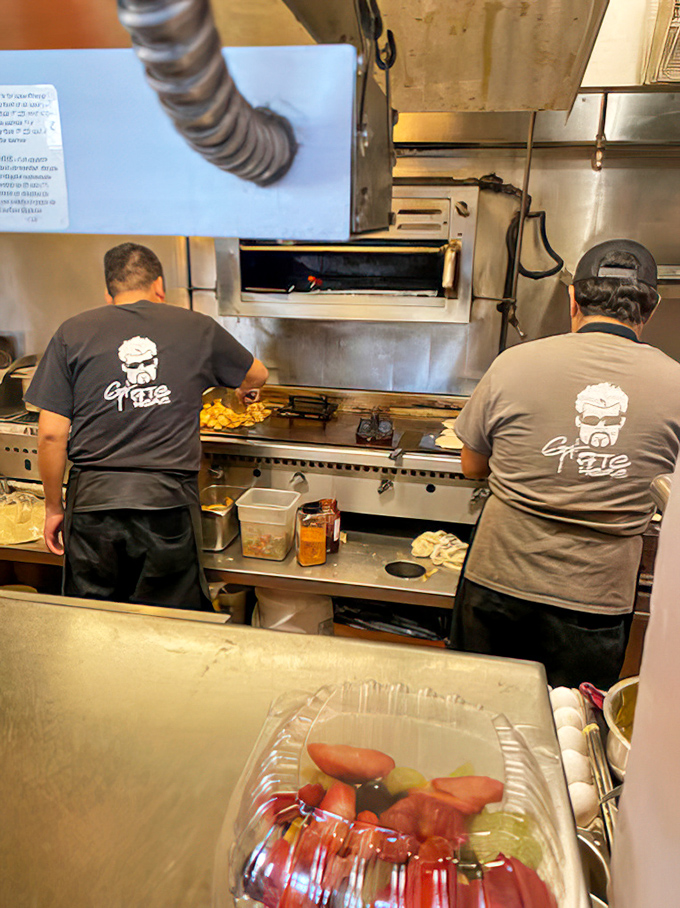 Behind the scenes, skilled cooks orchestrate breakfast magic on the grill—the unsung heroes of your perfect morning meal.
