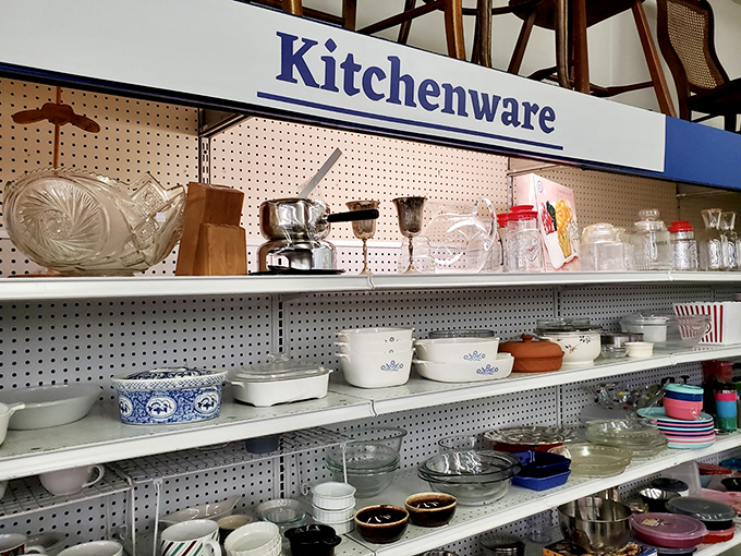 Kitchenware shelves stocked with everything from Corningware to crystal, ready to stock a first apartment or replace a broken heirloom.