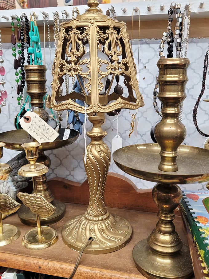 This brass beauty once illuminated Victorian parlor conversations. Now it waits to cast its golden glow on your late-night reading nook.