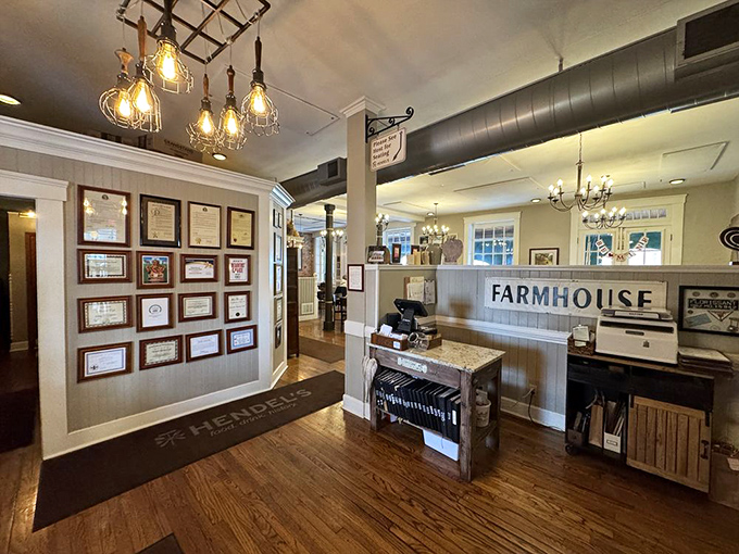 The lobby area showcases awards and farmhouse charm—visual proof that you've made an excellent dining decision before you've even seen a menu.
