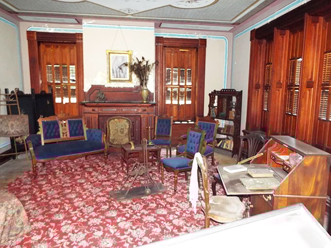 Blue velvet furniture and crimson carpets—Victorian decorators never met a rich color they didn't love. Minimalism was clearly not on the menu.
