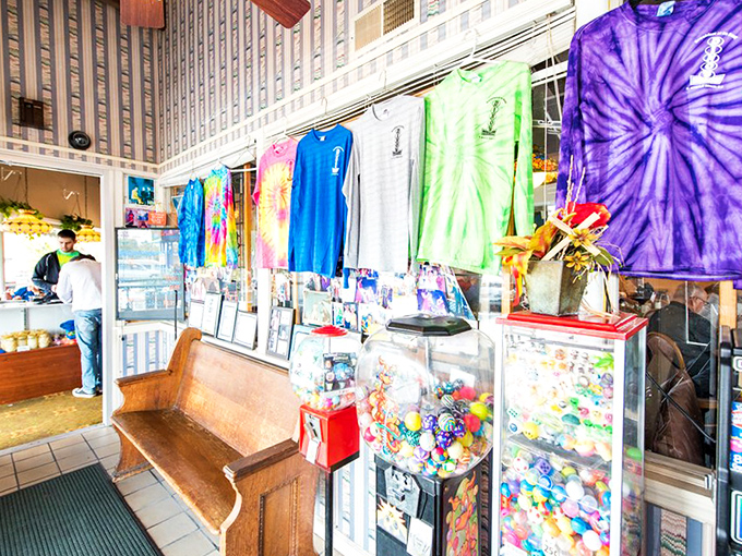 Even the merchandise corner feels like a throwback to simpler times. Tie-dye shirts and gumball machines—because why not?