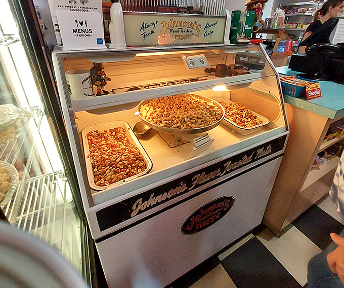 Johnson's New Fashioned Peanuts display case – because no proper American diner experience is complete without the temptation of freshly roasted nuts.