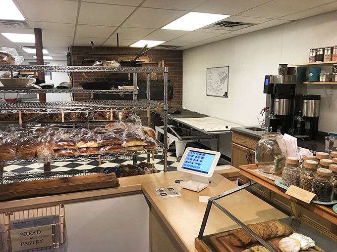 The counter where dreams and reality meet. This isn't just a transaction point—it's where the magic of freshly baked goods transfers from their hands to yours.