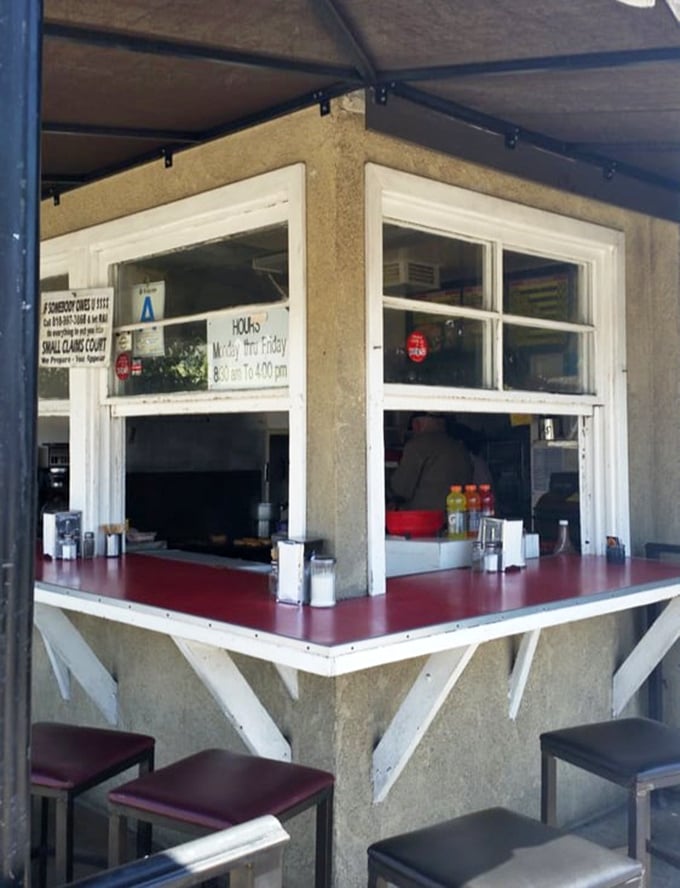 The order window - a portal to happiness where expectations are managed and burger dreams come true.