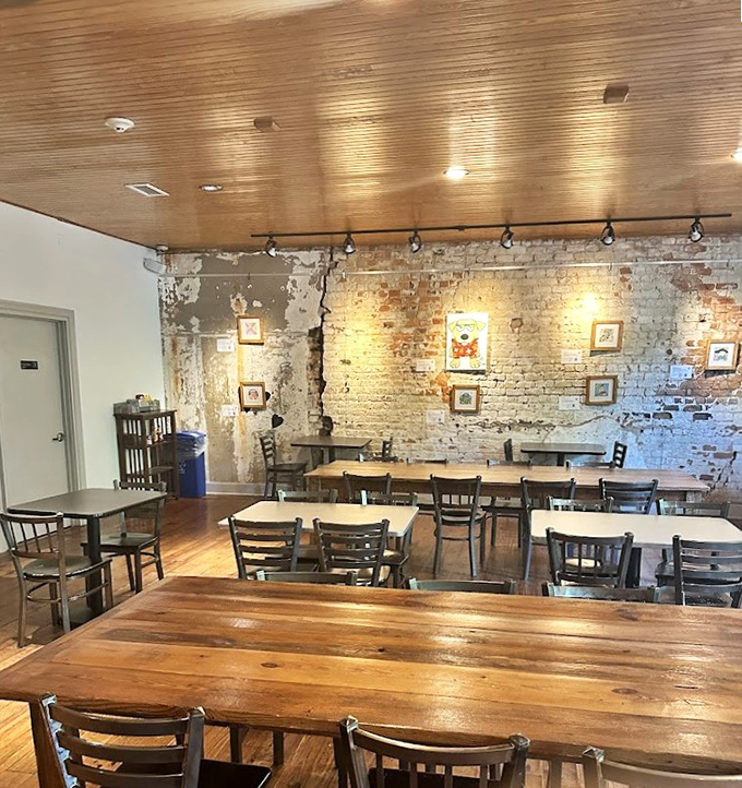 The dining room feels like that cool friend's apartment – the one with perfect lighting, comfortable seating, and walls that could tell fascinating stories.