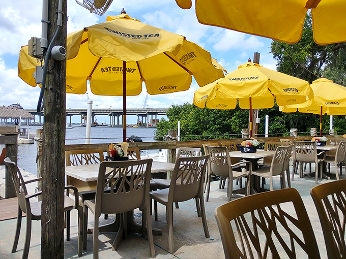 Waterfront dining at its most honest—where the river view competes with the food for your attention, and everybody wins that contest.