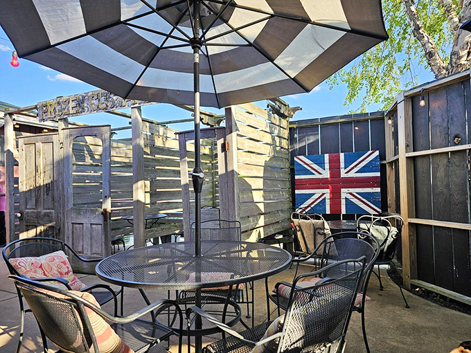 The outdoor patio, complete with Union Jack flag, offers a charming spot to enjoy your fish and chips while soaking up some Indiana sunshine.