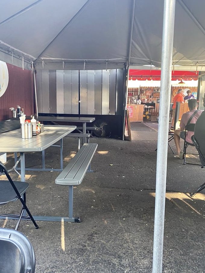 Outdoor seating under the tent offers fresh air with your fresh coffee—nature's dining room with the convenience of someone else cooking.