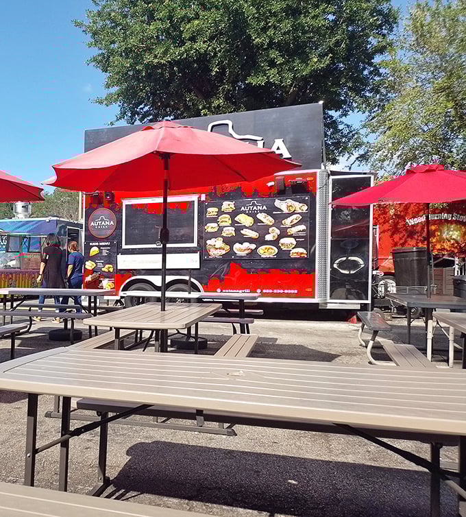 Outdoor dining area with a splash of color – the perfect spot to rest weary shopping legs and contemplate your next bargain battlefield.