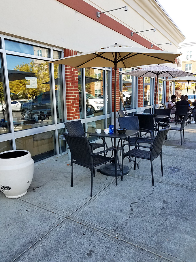 Al fresco dining that makes even Maryland humidity bearable. Those umbrellas aren't just for shade—they're keeping your secret food happiness private.