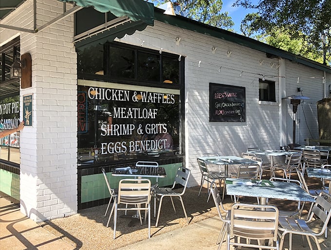 Outdoor seating that advertises the greatest hits on the windows. "Chicken & Waffles" and "Meatloaf" aren't just menu items—they're promises.