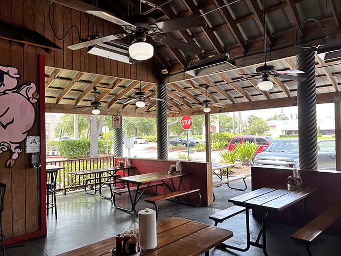 The covered patio offers al fresco dining with a side of people-watching. Even Florida heat surrenders to the pleasure of outdoor BBQ.