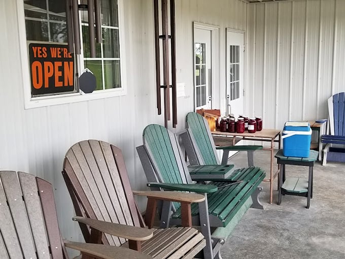 The front porch – where colorful Adirondack chairs and jars of homemade jam create the perfect setting for post-shopping contemplation.