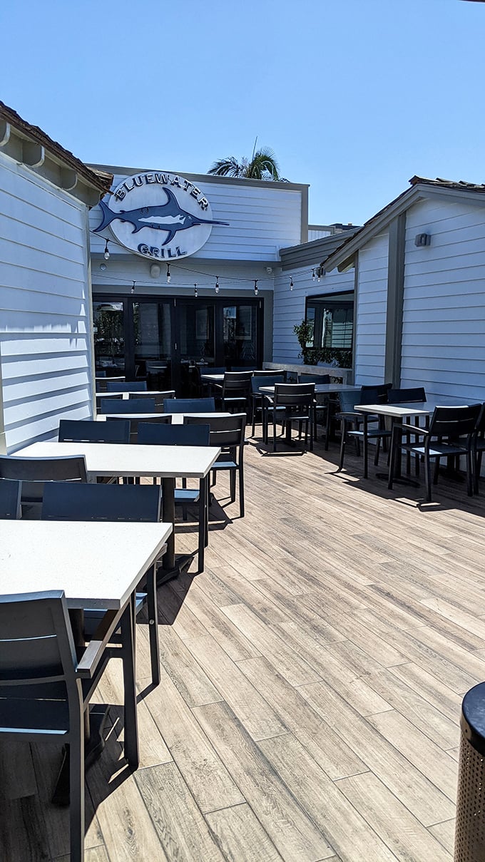 Al fresco dining with that quintessential California vibe—where the ocean breeze serves as both seasoning and air conditioning.