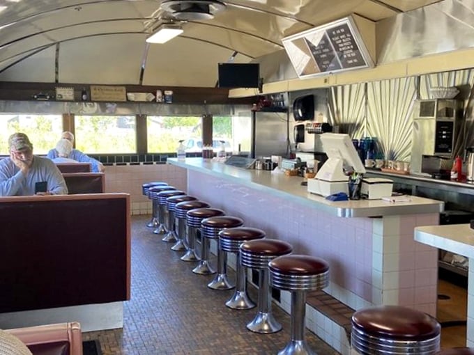 The heart of any great diner is its counter—where regulars perch on burgundy stools, watching short-order wizardry while trading local gossip.