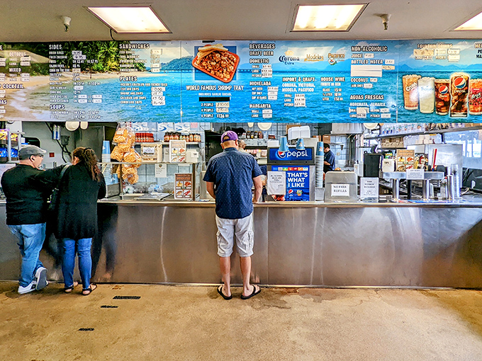 The gateway to flavor town – where seafood dreams are ordered, paid for, and soon to become delicious reality.