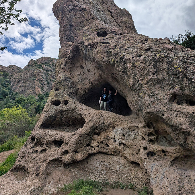 Mother Nature's sculpture garden features this porous masterpiece. Volcanic activity created this Swiss cheese rock formation millions of years before selfies existed.