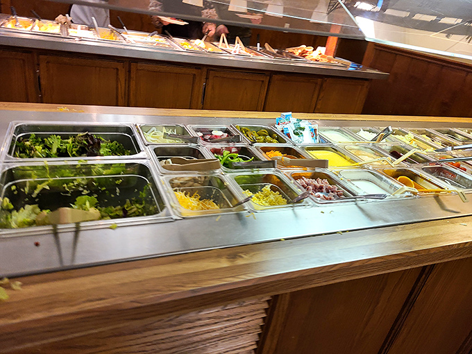 The salad bar—that obligatory first stop where you promise yourself "just a little" to save room, then somehow end up with a mountain anyway.