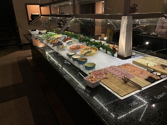 The salad bar—where good intentions meet reality. "I'll just have some vegetables," you say, before the meat skewers arrive.