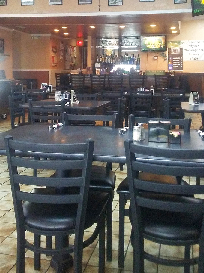 The dining room during the calm before the storm—tables patiently waiting for the next wave of hungry patrons.