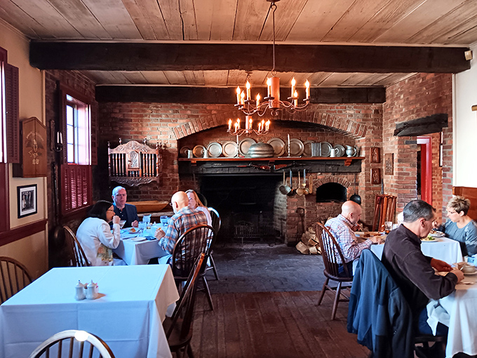 Dining beneath exposed brick and beside a historic fireplace—where the conversations happening today aren't so different from those two centuries ago.