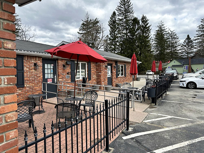 The outdoor seating area where patience is rewarded with the perfect spot to immediately devour your freshly acquired treasures.