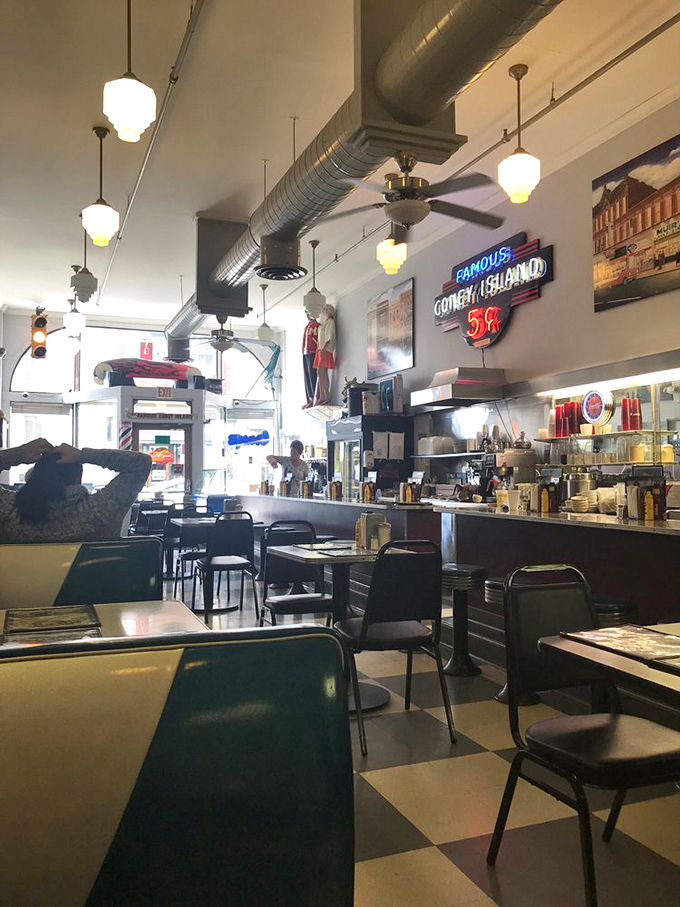 Where conversations flow as freely as the coffee refills, under the watchful gaze of vintage pendant lights and exposed ductwork.