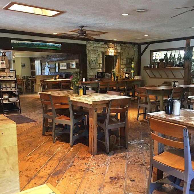 Tables that invite lingering, stone walls that whisper history, and wooden floors that have supported generations of happy diners.