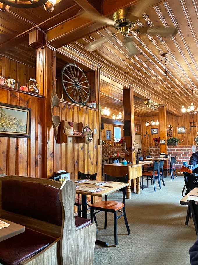 Rustic charm on display with wagon wheels and wooden accents—this isn't interior decoration, it's a time machine to simpler days when calories were just called "food."