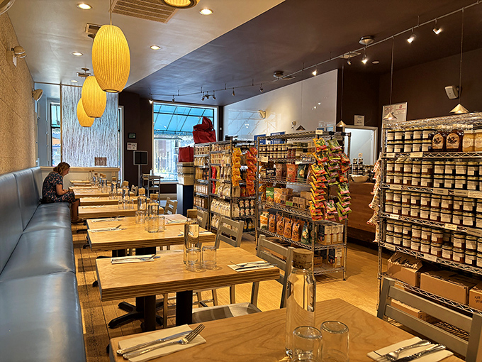 Where strangers become friends over the shared religion of exceptional breakfast. The grocery shelves aren't background—they're intermission entertainment.