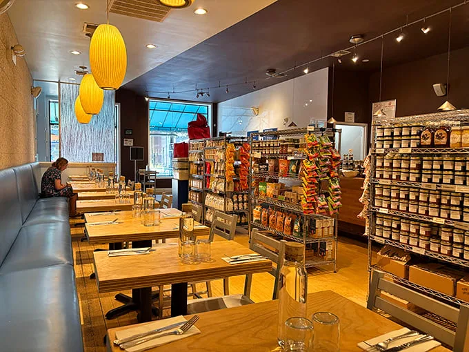 Where strangers become friends over the shared religion of exceptional breakfast. The grocery shelves aren't background—they're intermission entertainment.