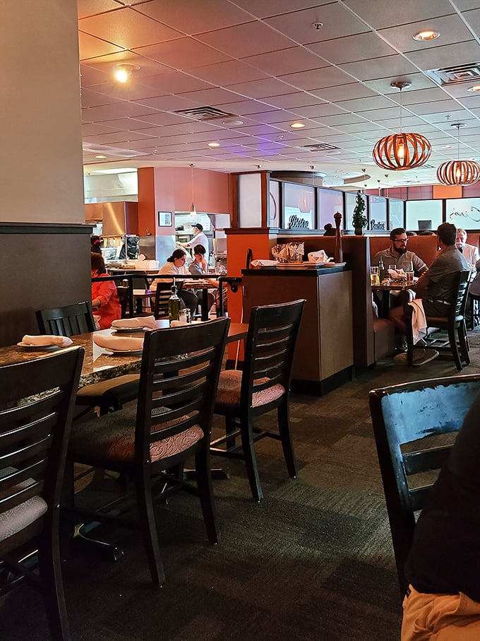 The dining room hums with that perfect restaurant energy—not too loud, not too quiet, just right for both celebration and conversation.