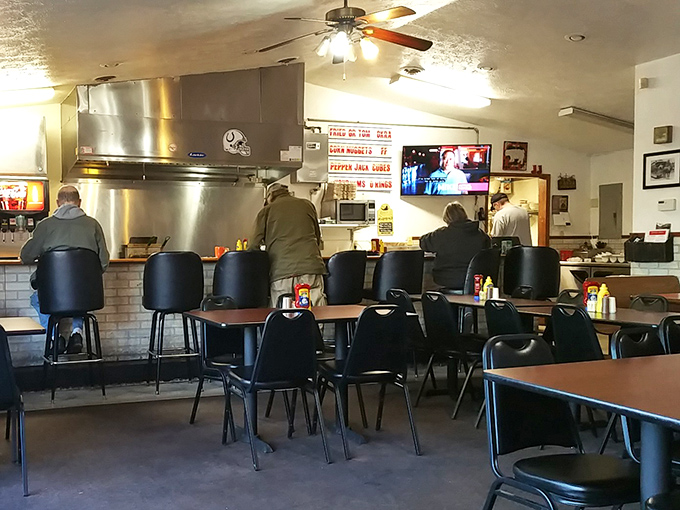 The counter seating at Jimmy's—where breakfast dreams come true and strangers become friends over coffee and gravy discussions.
