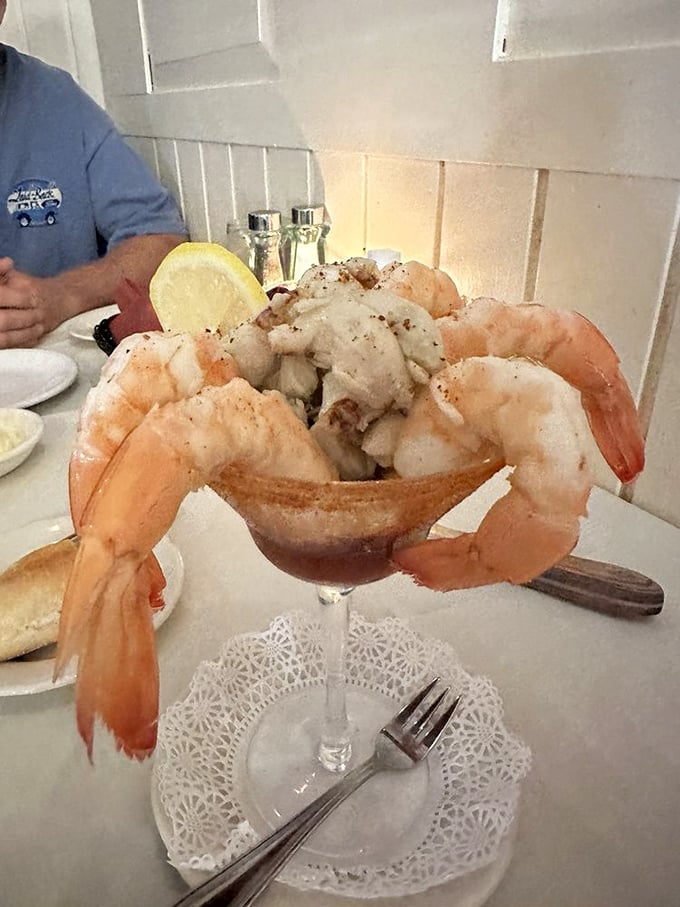 A shrimp cocktail that's showing off like it's auditioning for a seafood calendar—plump, perfectly curved, and ready for its close-up. 