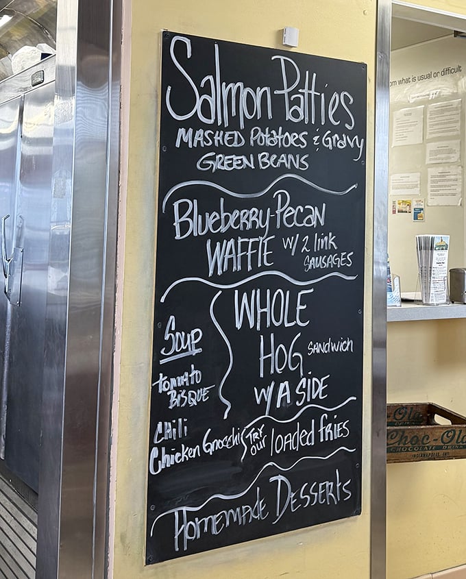 The daily specials board—where "Whole Hog" isn't just a sandwich, it's a philosophy. Blueberry-pecan waffle with sausage? The breakfast of champions.