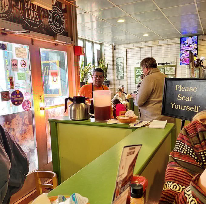 The host station – first checkpoint in your journey toward comfort food nirvana, complete with the welcoming "Seat Yourself" invitation.