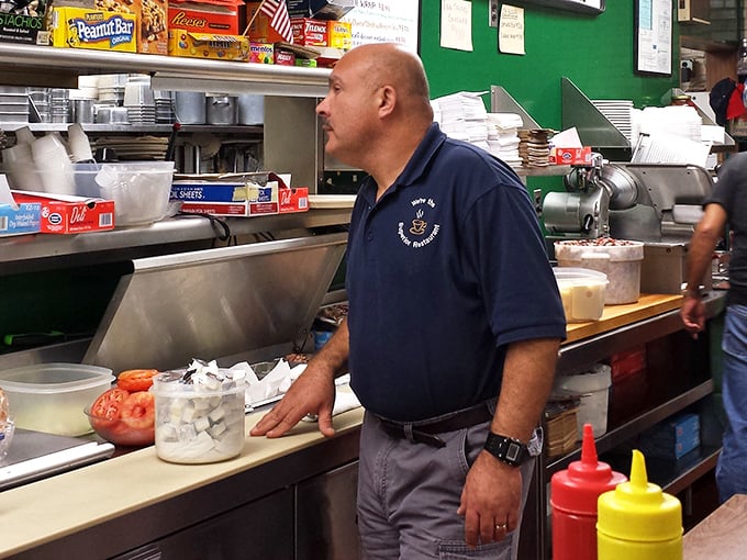 Behind every great deli is someone who knows exactly how much corned beef constitutes "enough"—and then adds a little more just to be sure. 