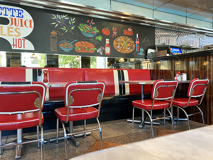 Those red booths aren't just seating—they're front-row tickets to the greatest show in town: authentic diner cuisine served with a side of nostalgia.