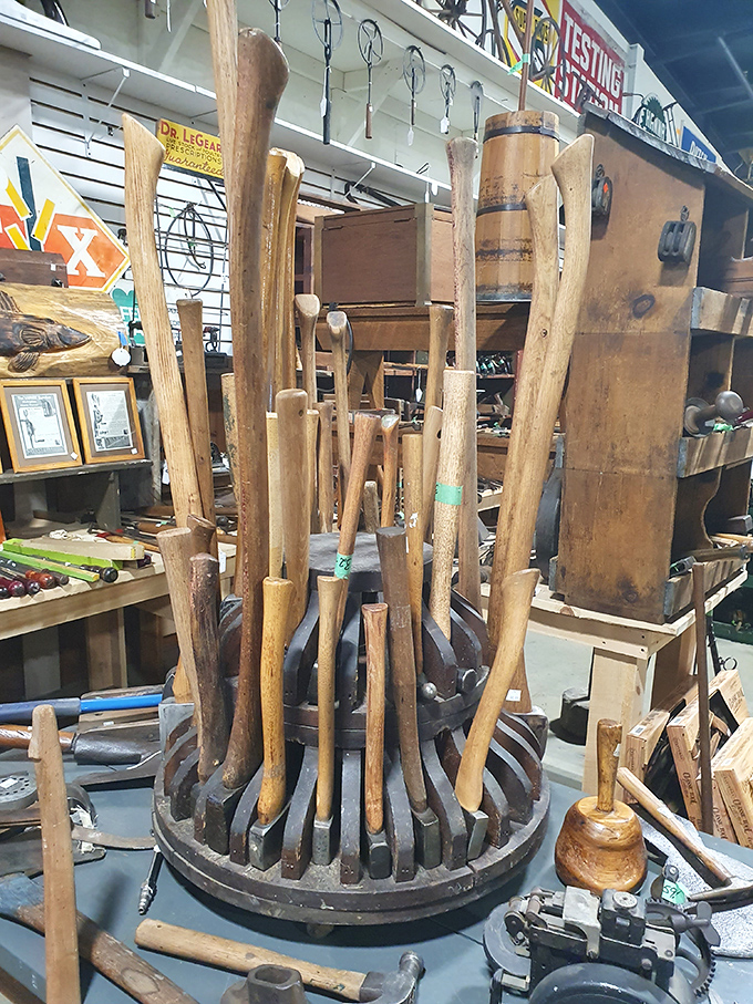 Tool handles arranged like a wooden bouquet—each one representing hours of honest work and craftsmanship that puts our disposable culture to shame.