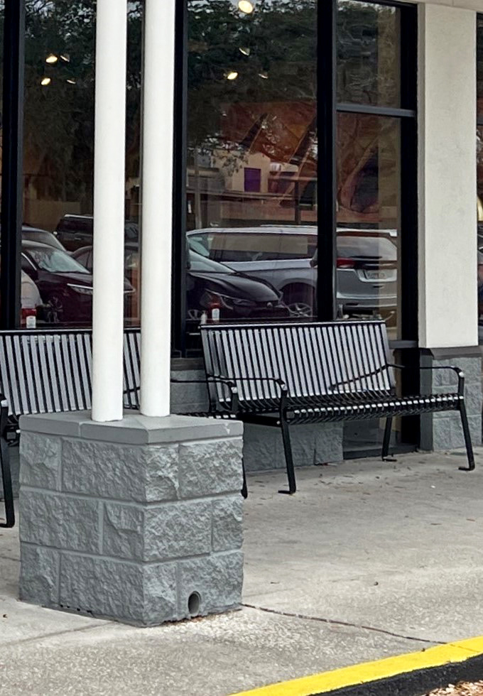 The waiting area bench—where breakfast anticipation builds and weekend newspapers get properly rumpled. Worth every minute.