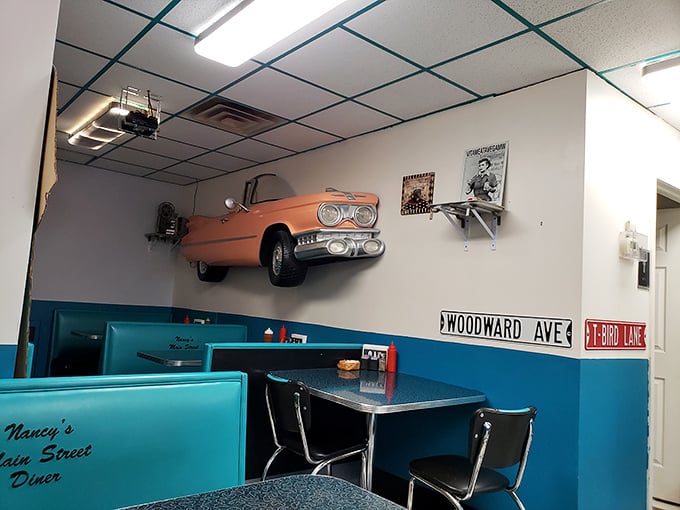 Automotive nostalgia meets breakfast bliss – that vintage car on the wall has witnessed countless first dates, family gatherings, and morning-after recoveries.