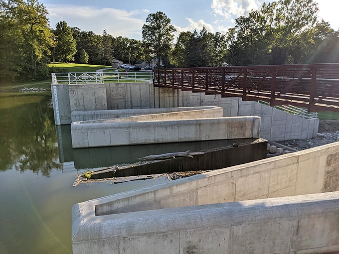 The spillway combines practical water management with unexpected beauty—engineering that's been quietly doing its job for decades.