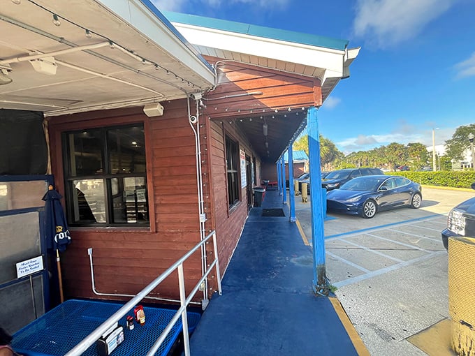 The blue-trimmed entrance isn't rolling out a red carpet, just a straightforward path to seafood nirvana.