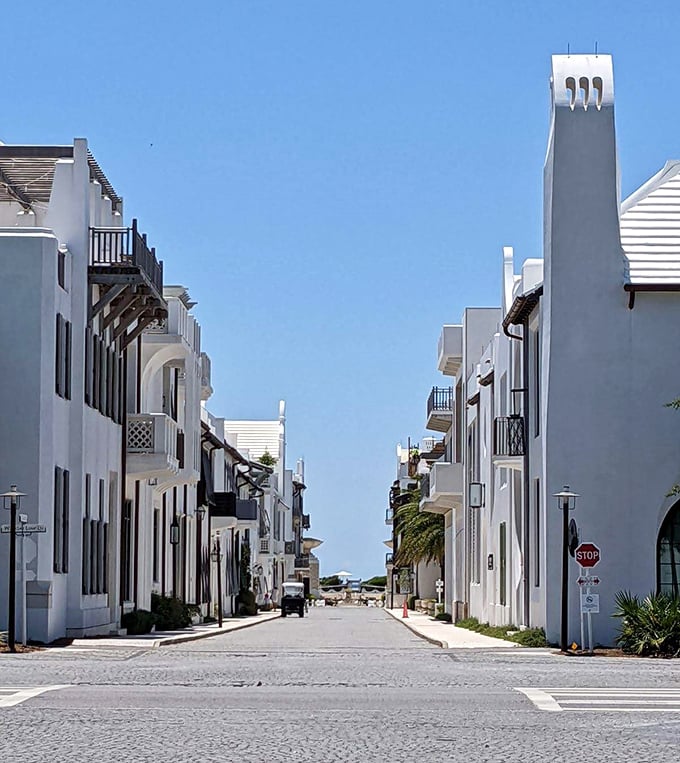 The pristine white architecture of Alys Beach stands in dramatic contrast to the blue Florida sky.