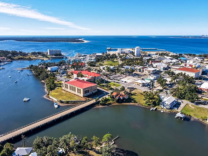 From above, Panama City's waterfront homes nestle between blue water and greener-than-green trees.