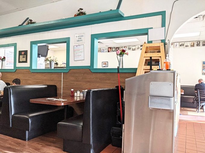 Comfortable booths invite you to linger over that second coffee – the turquoise trim adding a touch of retro charm.